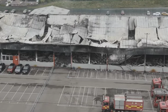 Massive fire devastates Ron Skinner dealership, investigation underway ...